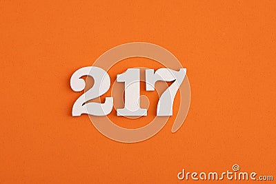 White Wooden Number 217 On Eva Rubber Orange Background Stock Image ...