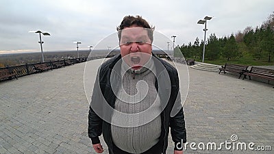 Wide Angle Lens: Young Fat Man Looking at Camera and Screaming Stock ...