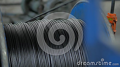 Winding Cable on a Rotating Coil. Production of Electric Cable. Stock ...
