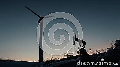 Windmill and Oil Rig at Sunset. Stock Footage - Video of industry ...