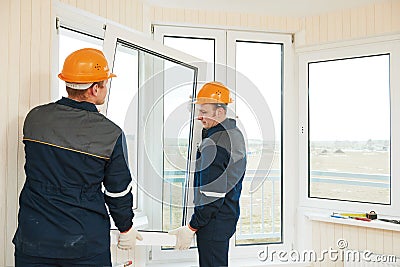 Workers Installing Glass Window on Building Stock Photo - Image of ...