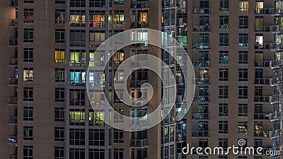Windows of the Multi-storey Building with Lighting Inside and Moving ...