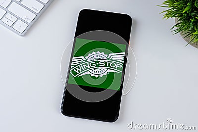 Wingstop App Logo On A Smartphone Screen. Editorial Image ...