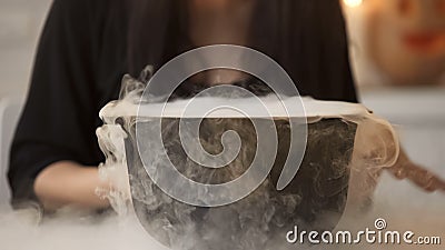 Witch Conjuring, Putting Magic Spell And Cooking Potion In Pot With ...