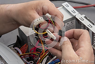 The Wizard Connects The Wires In The Computer, Plug And Socket. Repair ...