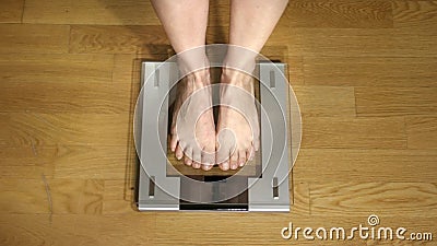 Woman Checking Weight On A Digital Scale, View From Below. Stock ...