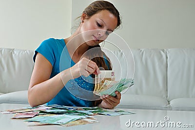 Woman Counting Money Stock Photos - Image: 22972483