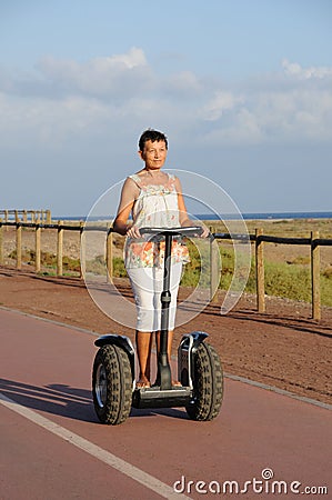 Woman Driving Segway Stock Image - Image: 11319721