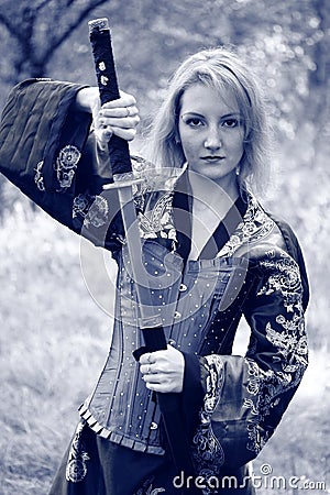 Woman With Katana Sword Stock Photography | CartoonDealer.com #16597466