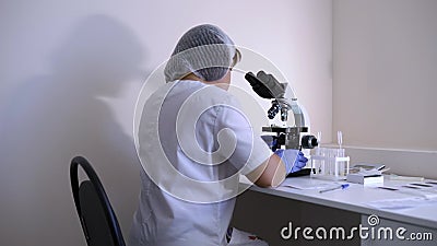 Woman Lab Technician Enters To Sit Down at His Workplace Laboratory for ...