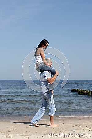 Woman Riding On Man's Shoulders Stock Photo - Image: 11077240