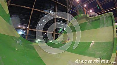 A Woman Slides Down a Slide in a Water Park Stock Video - Video of ...
