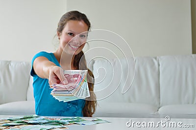 Woman spending money - Stock Image - Everypixel