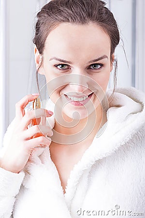 Woman Using Perfume Royalty-Free Stock Photography | CartoonDealer.com ...