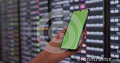 Woman Using White Mobile Device with Green Screen in Terminal Hall ...