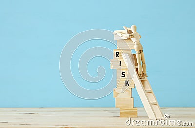 Wooden Dummy Climbs A Dangerously Unstable Structure And Risks Falling ...