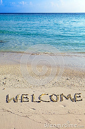 Word Welcome Is Written On Sand On Oceanside Stock Photo - Image: 14784900