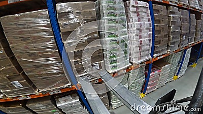 The Work of a Forklift in a Warehouse Pov. Modern Forklift Works in a ...