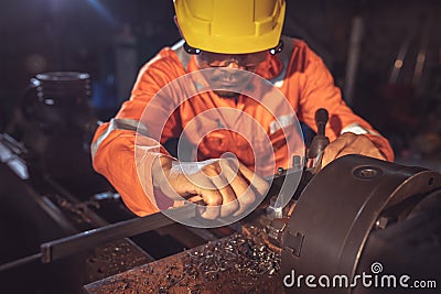 Worker Handles Metal At Lathe Turner Measures The Dimensions Of The ...