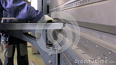 Worker Hands Bend Metal Sheet on a Modern Bending Industrial Machine at ...