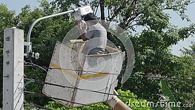 Worker on Height Lifting Platform Installing New Street Light Bulb ...