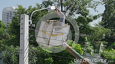 Worker on Height Lifting Platform Installing New Street Light Bulb ...