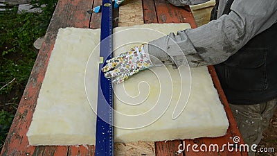 Worker Knife Cutting Rockwool for House Insulation Stock Footage ...