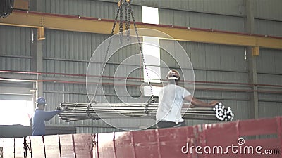 Worker Loading Steel Bars in Lorry with Crane - Tilt Stock Video ...