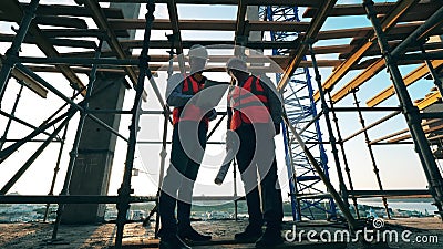 Workers in Uniform Stand in Unfinished Building. Stock Video - Video of ...