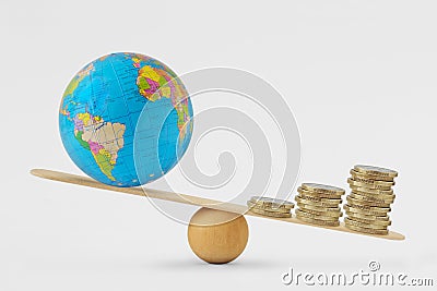 World Globe And Coins Stack On Balance Scale - Concept Of Economic ...
