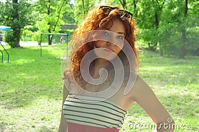 Young beautiful red-haired woman thinking - Stock Image - Everypixel