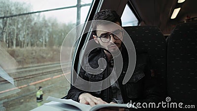 Young Boy Riding Train and Reading Book. Boy with Glasses. 4K Stock ...
