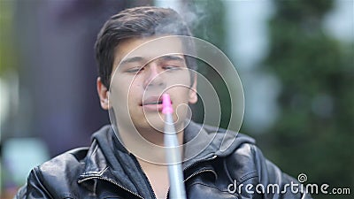 Young boy smoke the hookah stock video. Video of attractive - 86597905