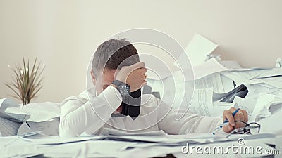Young Businessman Hid Behind with Stack Papers. a Huge Pile of Papers ...