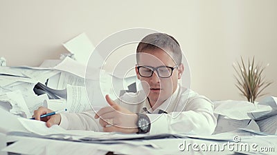 Young Businessman Hid Behind with Stack Papers. a Huge Pile of Papers ...
