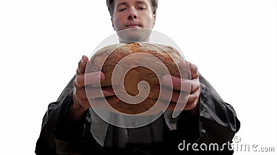 Young Catholic Priest Breaking Bread Stock Footage - Video of collar ...