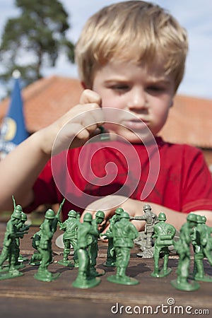 Young Child Playing Soldiers Royalty-Free Stock Image | CartoonDealer ...
