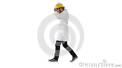 Young Construction Engineering Student Walking and Putting Cap on on ...