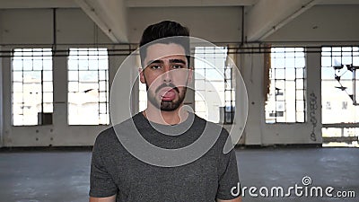 Young Man Blowing Raspberry To Camera Stock Video - Video of face ...