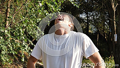 Young Man Doing Evil Laughter Stock Video - Video of landscape ...