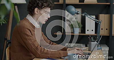 Young Man Entrepreneur Typing with Laptop Using Computer at Work ...