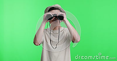 Young Man Explorer in Hat Looking through Binoculars Stock Video ...