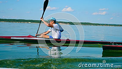 Young Man is Floating in a Canoe in a Side View Stock Footage - Video ...