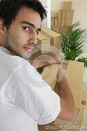 Young Man Packing Boxes Royalty-Free Stock Photography | CartoonDealer ...