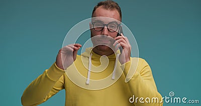 Young man posing in studio stock footage. Video of talking - 258592012