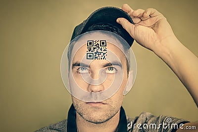 Young Man With A Qr Code On His Forehead. A Man With A Stupid ...