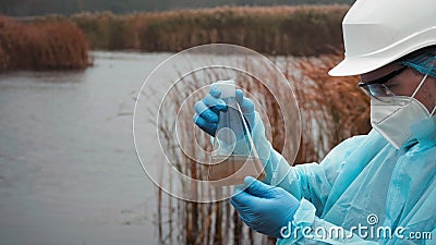 Young Scientist Biologist Analyzes Pollution of Water and Soil, Man ...