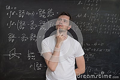 Young Student Is Thinking And Solving Mathematical Problem. Math ...