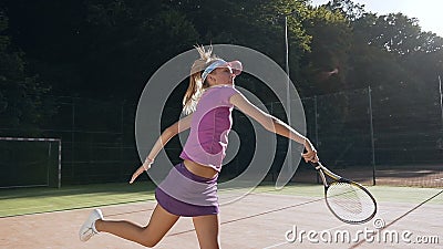 Young Tennis Player Hitting the Ball Using a Racket during Training ...
