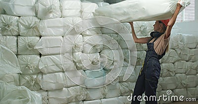 Young Woman in Special Uniform Taking Sack, Opening it, Taking ...